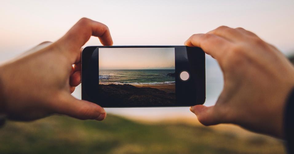 Taking a, horizontal picture at sunset