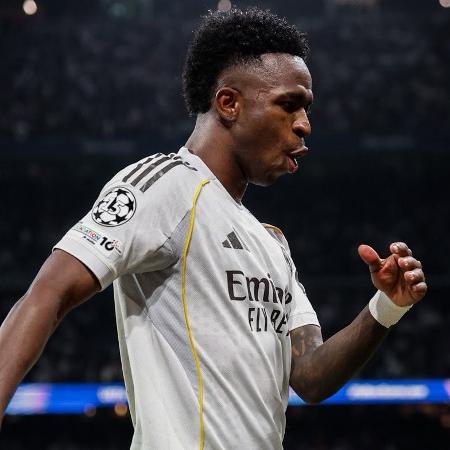 Vini Jr. marca e dança, Real vence Benfica e vai às oitavas da Champions